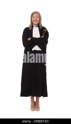Smiling senior judge with gavel on white background Stock Photo - Alamy