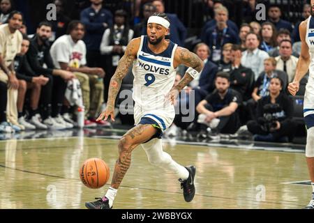 Minnesota Timberwolves forward Nickeil Alexander-Walker (9) works ...