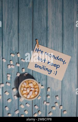 It's Monday But Keep Smiling Sign on white paper. Man Hand Holding ...