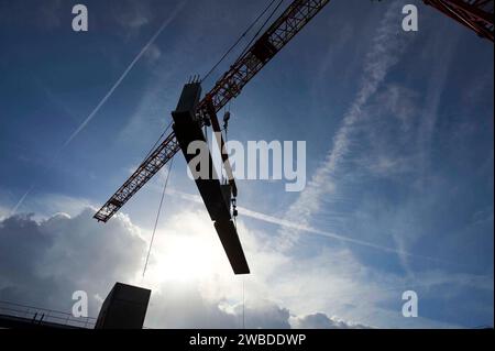 Crane lifting pre cast concrete panels on a UK construction site Stock ...