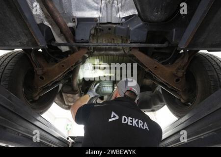 Stuttgart, Germany. 10th Jan, 2024. An employee of the testing ...