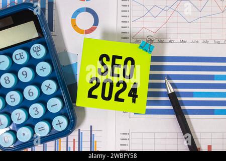 On the magnifying glass are paper strips with the inscription - MAKE ...