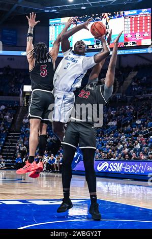 Saint Joseph's Lynn Greer III, right, looks for an opening against ...