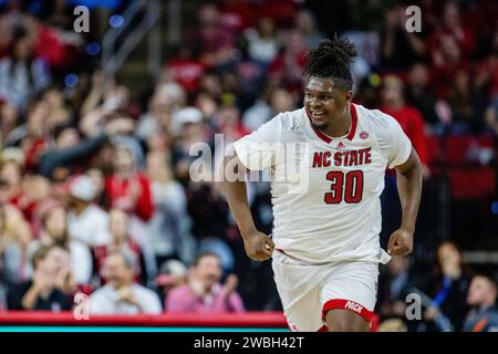 North Carolina State's DJ Burns Jr. (30) drives the ball into Duke's ...