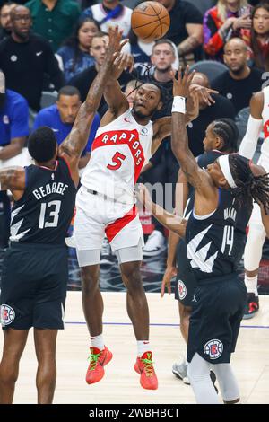 Toronto Raptors' Immanuel Quickley (5) looks to pass during the second ...