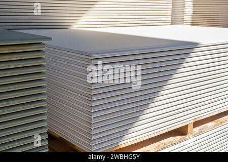 The stack of WHITE drywall Standard Gypsum board panel. Plasterboard ...