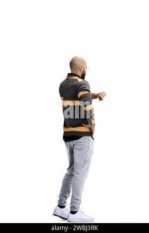 Unhappy man in striped t-shirt screaming and rubbing temples because of ...