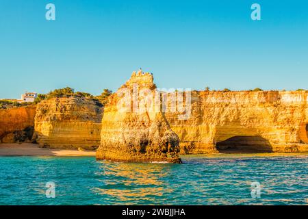 Beautiful limestone Algarve coast with caves and rock formation ...