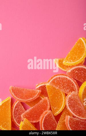 Marmalade in the form of lemon and orange slices on a white background ...