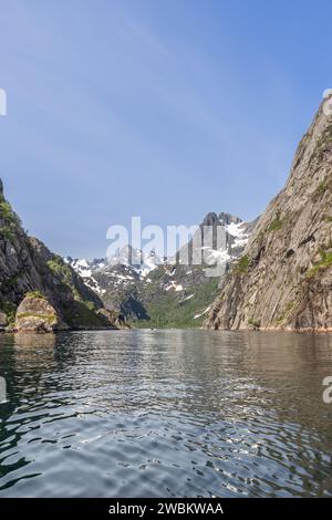 A vertical shot of snowy peaks of cliffs on a sunny day Stock Photo - Alamy