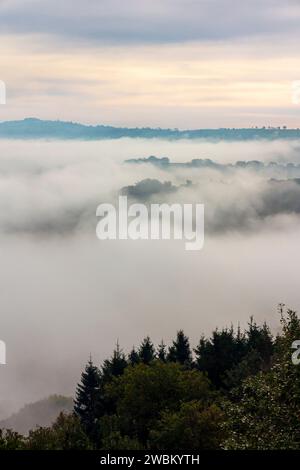 View south from Stanton Moor over misty landscape caused by cloud ...