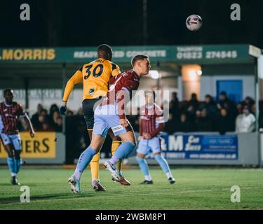Frank Nouble goes for goal but Nick Grimes heads clear of goal Stock ...