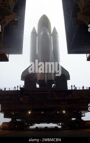 KENNEDY SPACE CENTER, Fla. -- Fog-enshrouded Space Shuttle Discovery ...