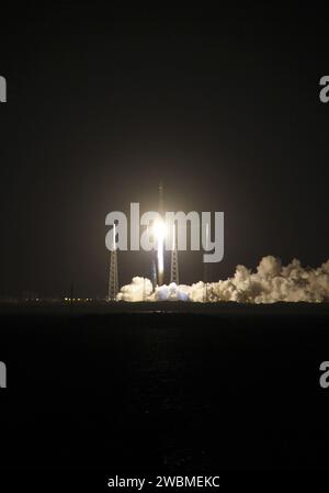 CAPE CANAVERAL, Fla. -- Plumes of exhaust and smoke build around the base of a lightning mast on ...