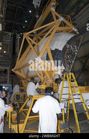 CAPE CANAVERAL, Fla. -- Technicians install a new Ku-Band ...