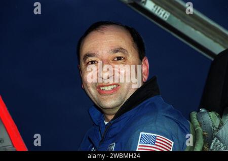 STS-98 Pilot Mark Polansky grins on his arrival at the Shuttle Landing ...