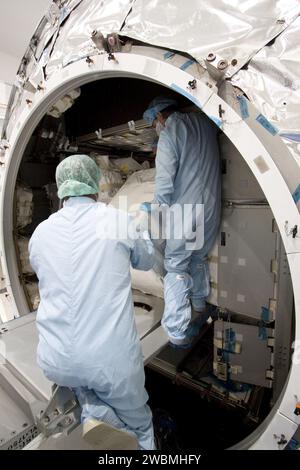 CAPE CANAVERAL, Fla. -- Technicians install a new Ku-Band ...