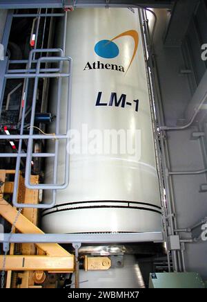 Castor 120 first stage of Athena 1 launch vehicle is lifted vertically ...