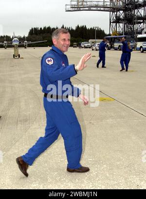 STS-98 Pilot Mark Polansky grins on his arrival at the Shuttle Landing ...