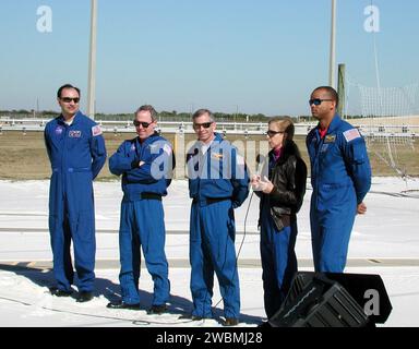 STS-98 Pilot Mark Polansky grins on his arrival at the Shuttle Landing ...