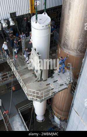 Cape Canaveral, Fla. -- Workers using a large crane dismantle the final ...