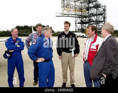 STS-98 Pilot Mark Polansky grins on his arrival at the Shuttle Landing ...