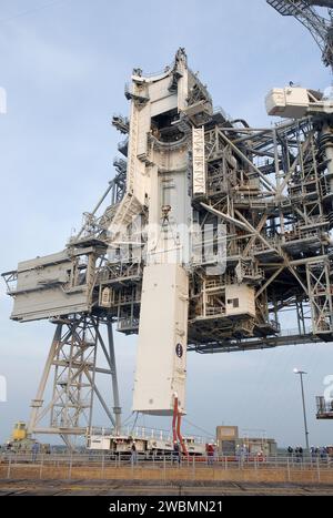 Space Shuttle Endeavour is lifted into a vertical launch configuration ...