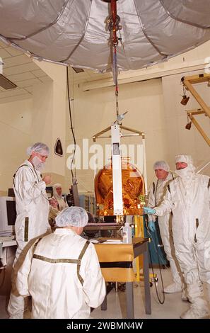 The Gamma Ray Spectrometer (GRS) is installed by technicians on the ...