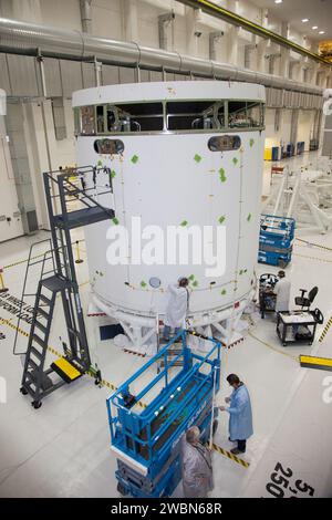 The spacecraft adapter jettison fairing panels are secured onto Orion’s ...