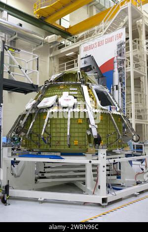 The Artemis I Orion crew module pressure vessel is loaded on NASA's ...