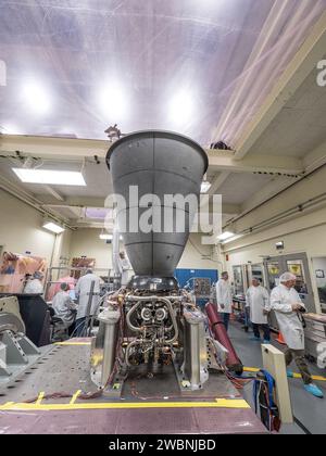 An Orbital Maneuvering System engine is vibration tested at NASA’s ...