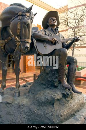 A bronze sculpture of actor/singer Gene Autry and his horse is ...