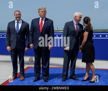 Vice President Mike Pence and President Donald Trump listen as people ...
