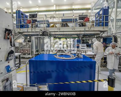 Engineers from Lockheed Martin assemble the Artemis I Orion crew module ...