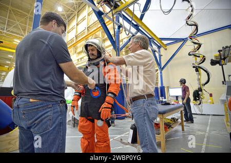 Astronaut Rex Walheim uses the Active Response Gravity Offload System ...