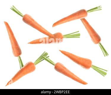 Fresh ripe carrots falling on white background Stock Photo - Alamy