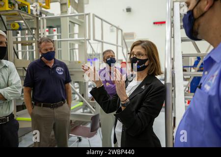 Senior managers at NASA’s Kennedy Space Center pose inside the Florida ...