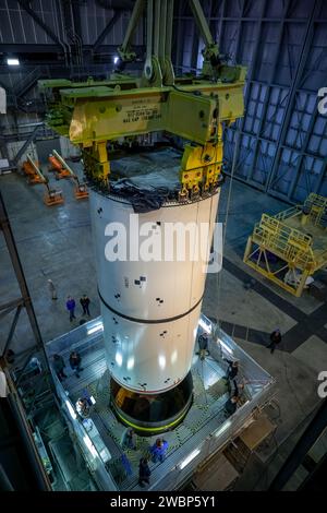 Technicians with NASA’s Exploration Ground Systems move the launch ...