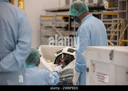 Technicians unpack and inspect a Nitrogen/Oxygen Recharge System (NORS ...