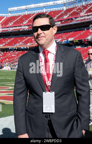 San Francisco 49ers CEO Jed York, left, signs autographs for fans prior ...