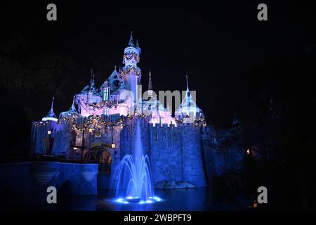 Disney Sleeping Beauty Castle - Lit Up view Stock Photo - Alamy