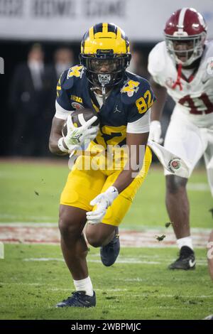 Michigan wide receiver Semaj Morgan, right, runs against Wisconsin ...