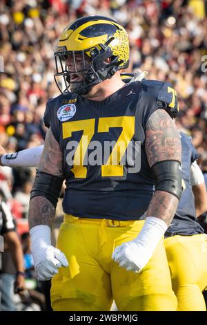 Michigan offensive lineman Trevor Keegan runs a drill at the NFL ...