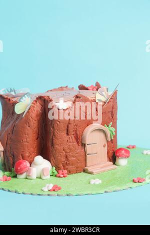 Easter log cake with textured look on the tree trunk and Easter bunny ...