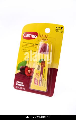 Carmex brand cherry flavored moisturizing lip balm isolated on white ...