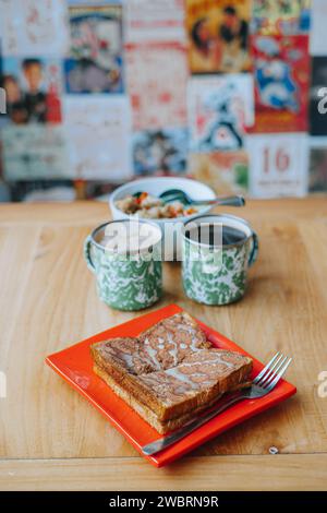 Kopitiam breakfast menu set contains a toast and two cup of coffee with ...