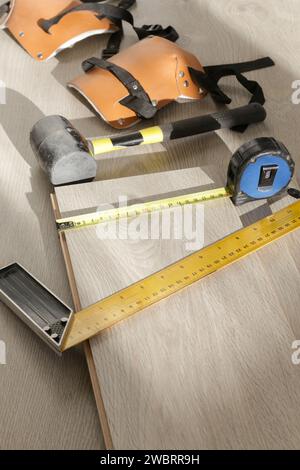 Rubber hammer, ruler with angle bar, tape meter, jig saw and other ...