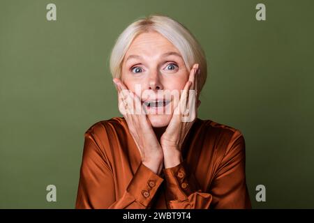 Photo of adorable impressed lady wear violet t-shirt playing ...