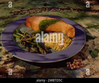 Fried salmon fish fillets with asparagus Stock Photo - Alamy