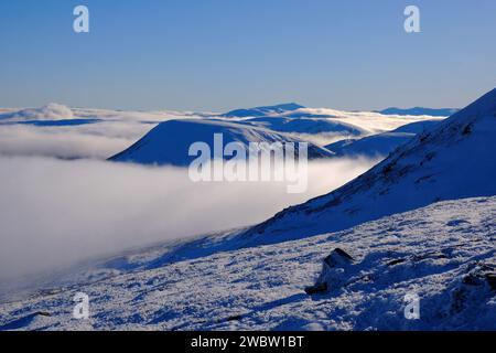 Drumochter, Scotland, UK. 12th Jan 2024. Snow on the munros and cloud ...